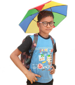 boy uses umbrella