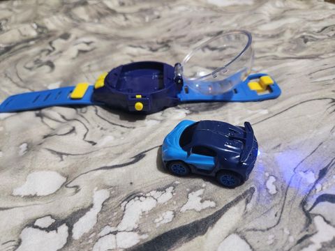 Ragiluxe USB Rechargeable RC Watch Car Toy Mini Remote Control Racing ...
