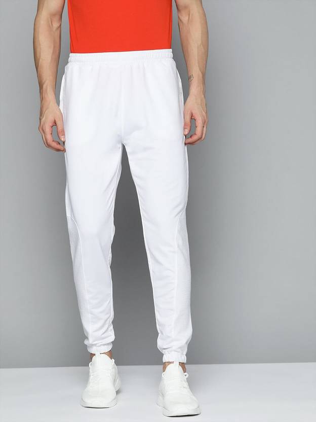 HRX by Hrithik Roshan Solid Men White Track Pants - Buy HRX by Hrithik ...