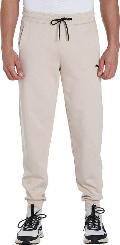 PUMA RAD/CAL Pants Solid Men Beige Track Pants - Buy PUMA RAD/CAL Pants ...
