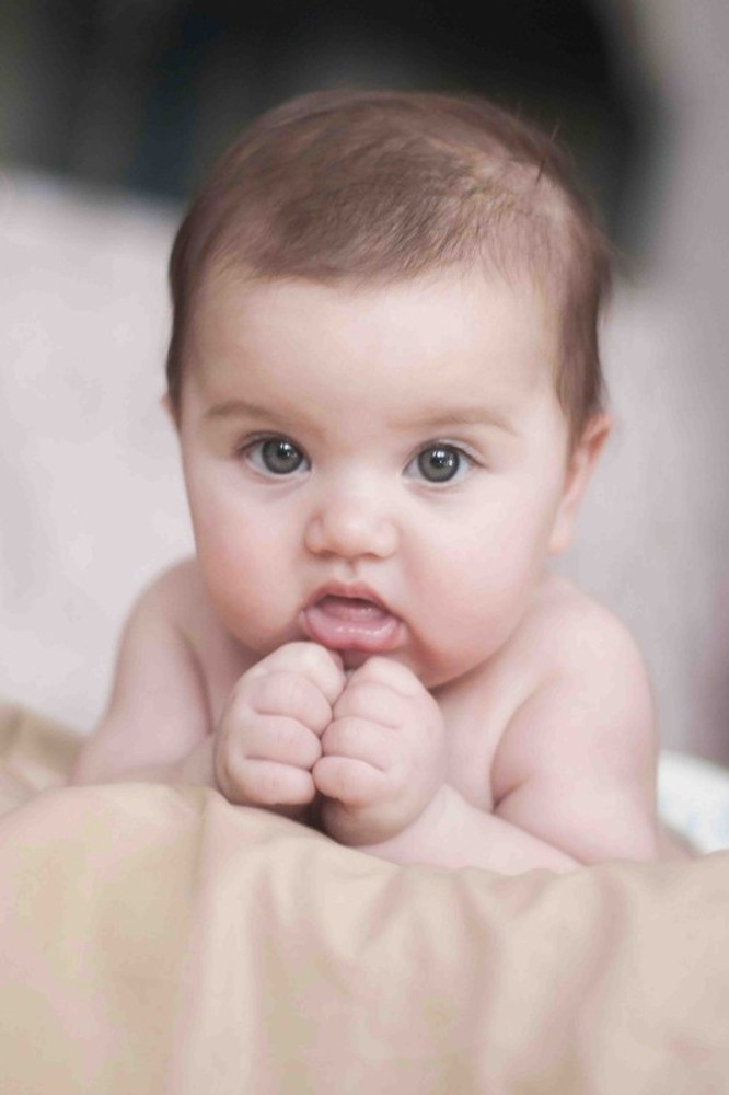 Cute Baby Girl With Grey Eyes