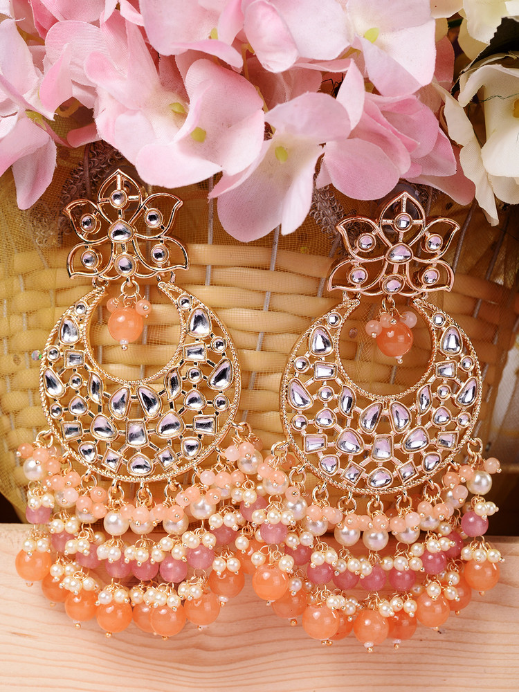 Orange kundan earrings store