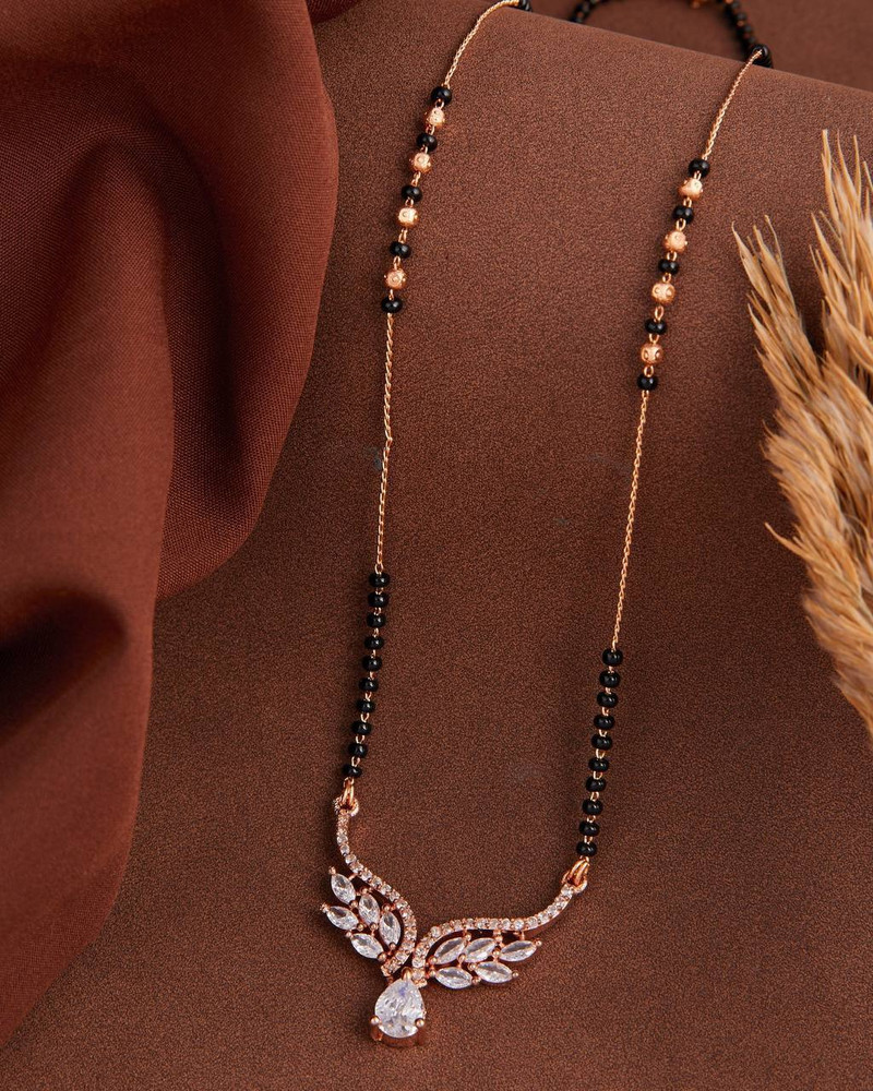 GINTOS GINTOS 9 LINE GOLD PLATED MANGALSUTRA Brass Mangalsutra Price in India Buy GINTOS GINTOS 9 LINE GOLD PLATED MANGALSUTRA Brass Mangalsutra Online at Best Prices in India Flipkart