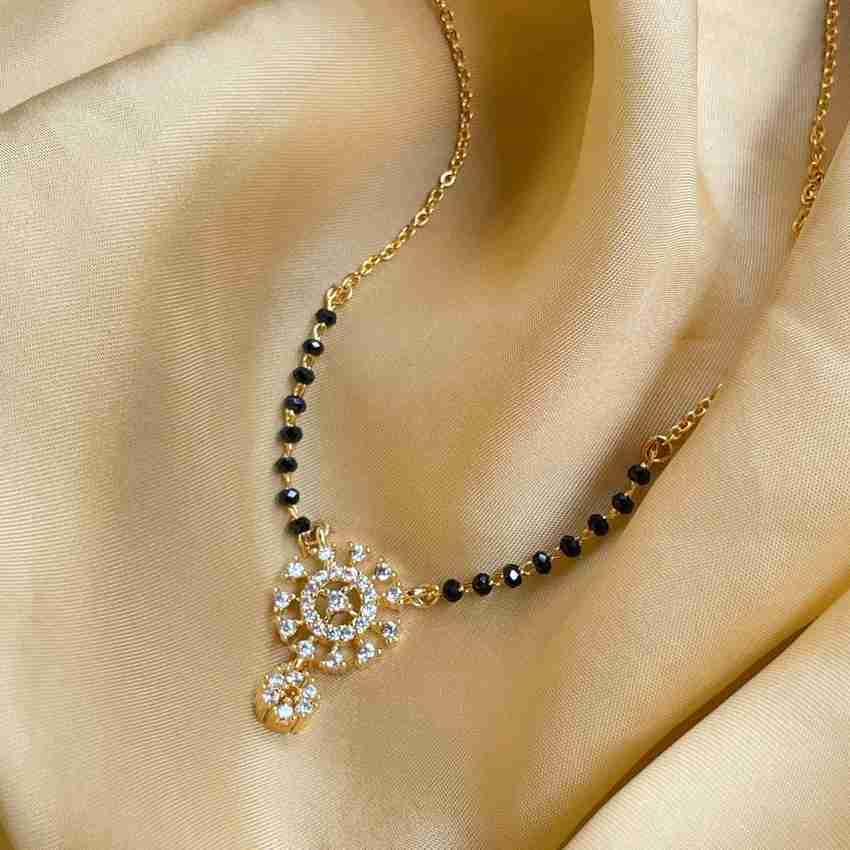 Mak Beautic Gold Plated Sun Ray Shape Pedant with Fancy Black Beads chain Mangalsutra Alloy Mangalsutra Price in India Buy Mak Beautic Gold Plated Sun Ray Shape Pedant with Fancy Black