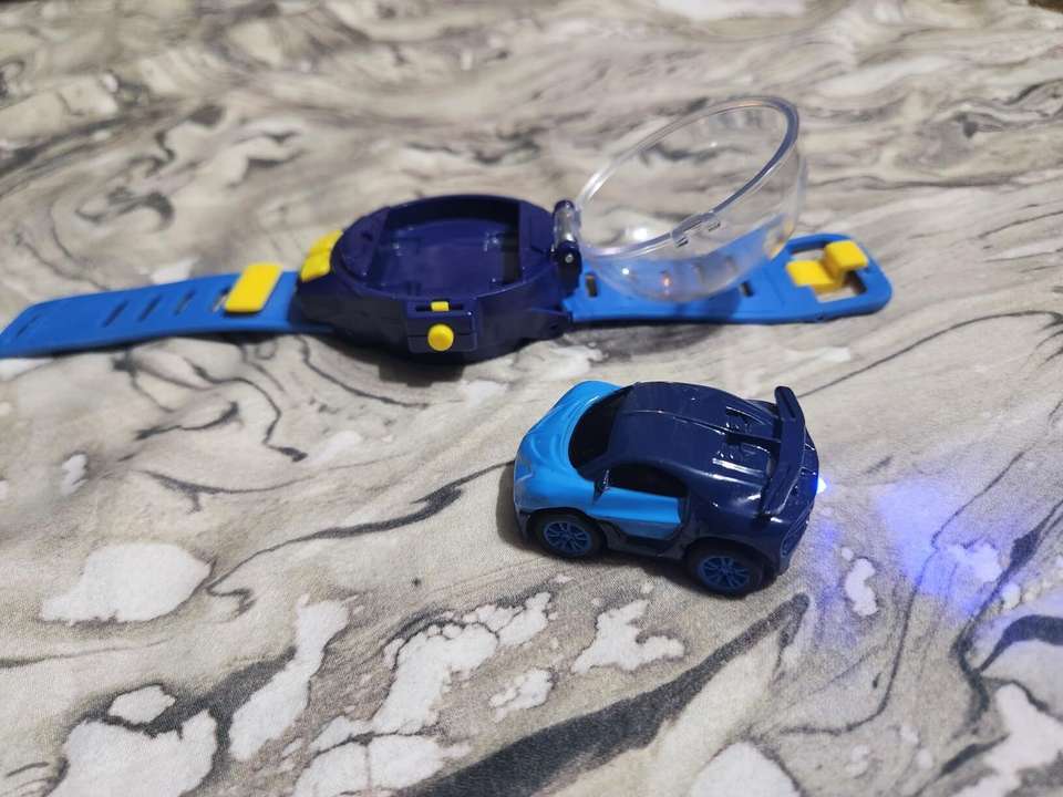 Ragiluxe USB Rechargeable RC Watch Car Toy Mini Remote Control Racing ...